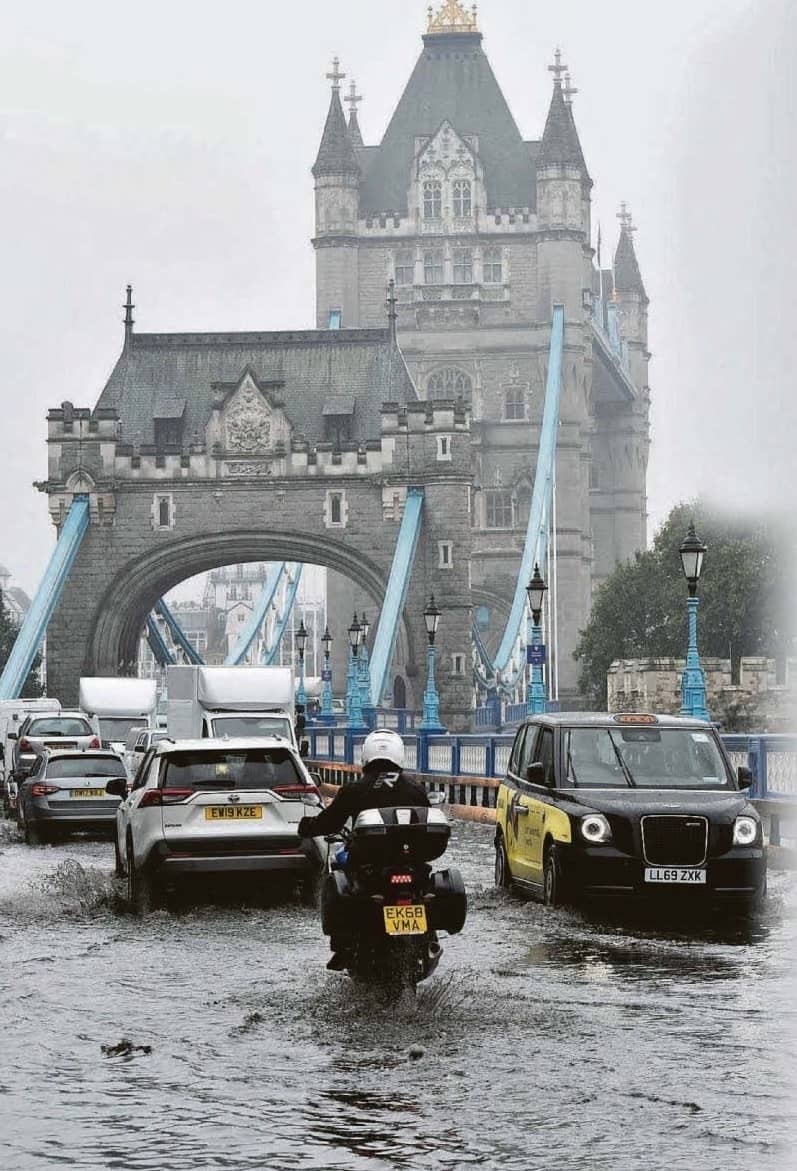 Road's now a river on Shower Bridge | Daily Mirror - Newspaper - Read ...